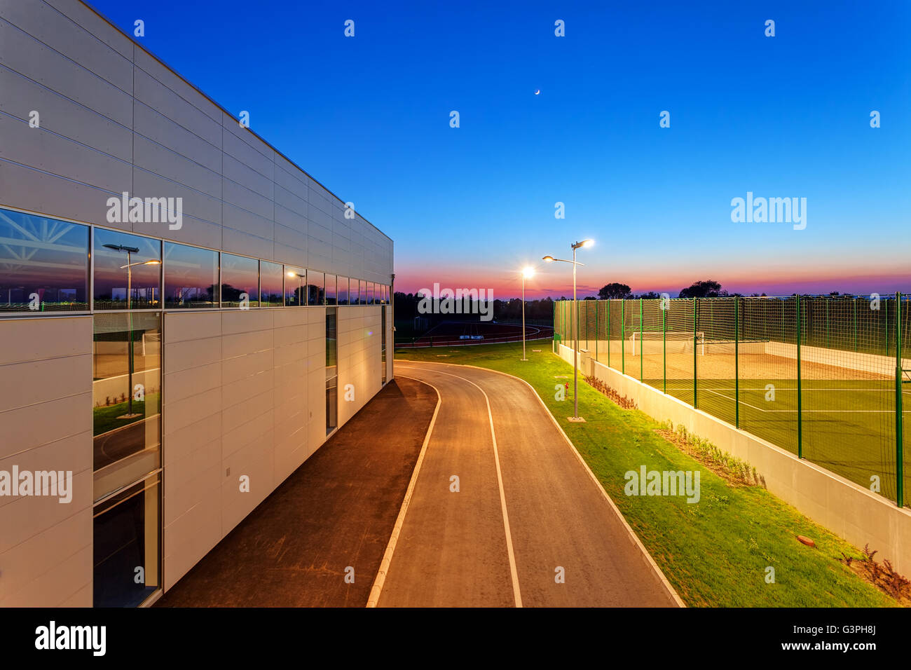 Small football pitch in sports center at night Stock Photo - Alamy
