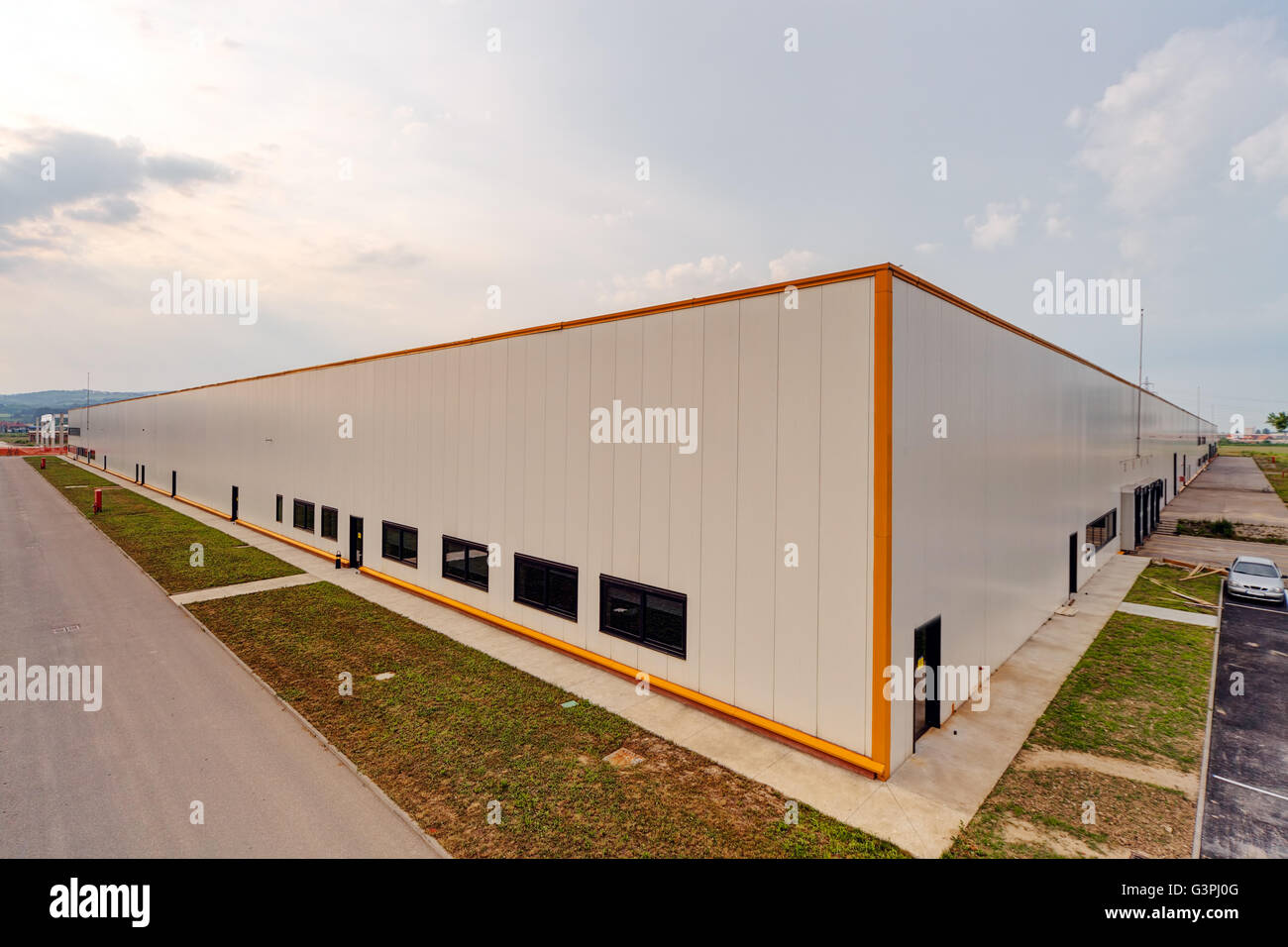 Aerial photo of facade on large industrial building made of aluminum ...