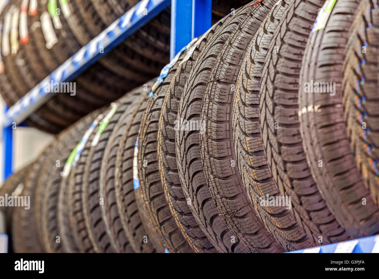 Car tires at warehouse in tire store Stock Photo - Alamy