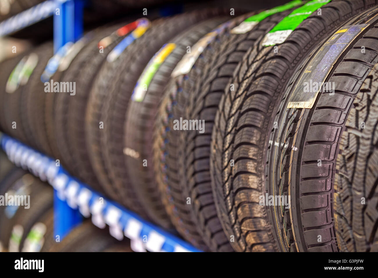 Car tires at warehouse in tire store Stock Photo - Alamy
