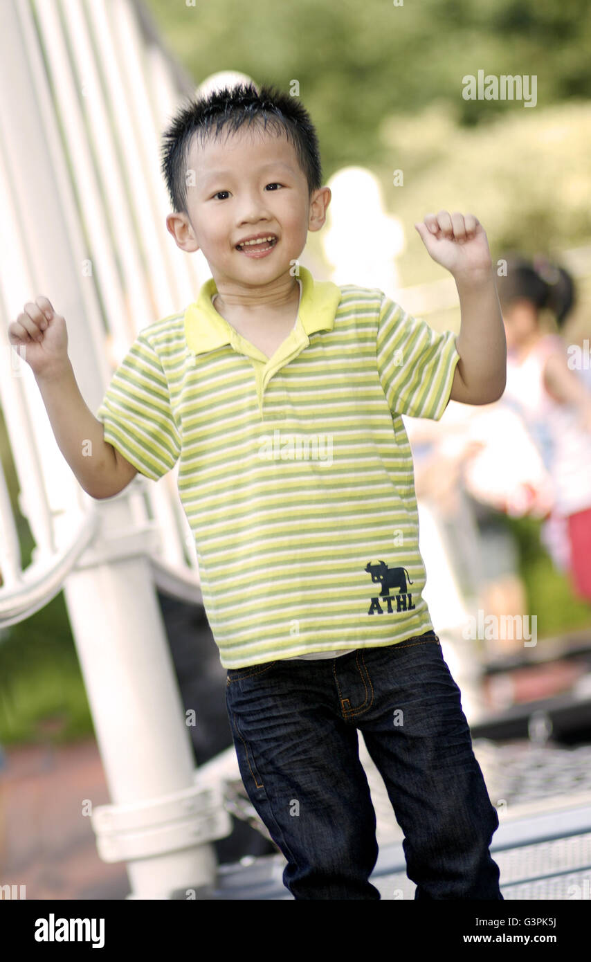 Chinese boy play in the playground Stock Photo - Alamy