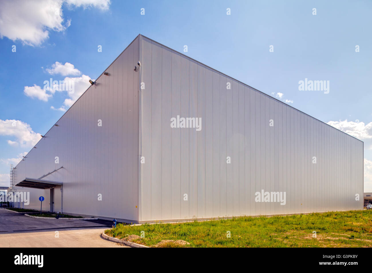 Facade on large industrial building made of aluminum panels Stock Photo ...