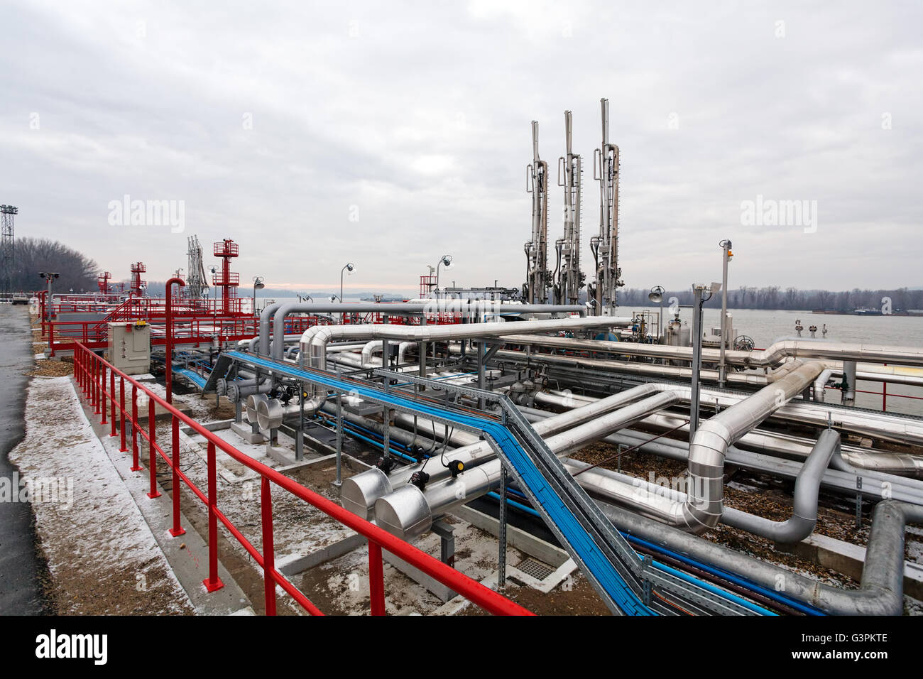detail of oil pipeline with valves in large oil refinery Stock Photo ...