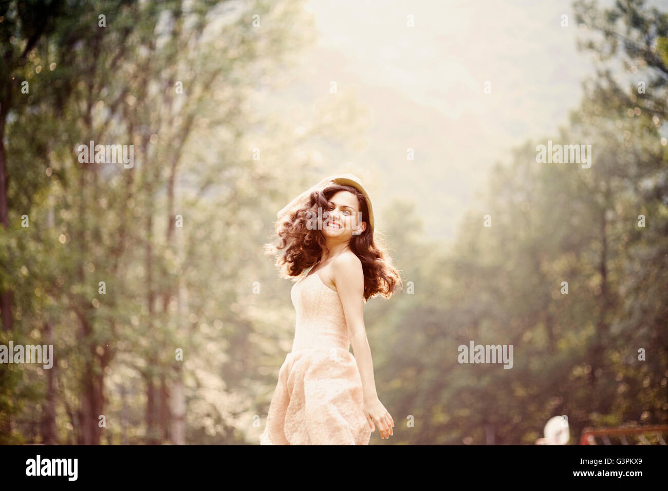 Girl dancing at sunset Stock Photo - Alamy