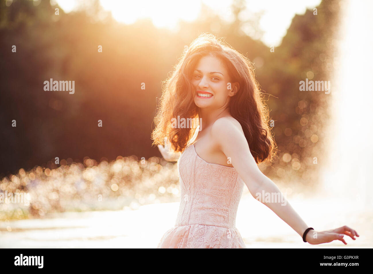 Girl dancing at sunset Stock Photo - Alamy