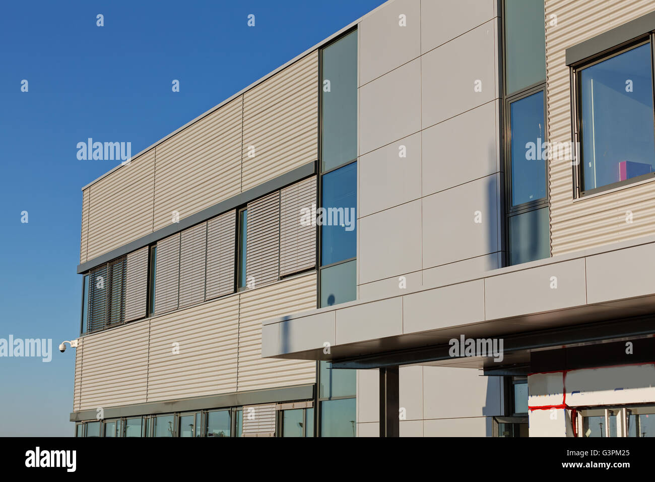 details of aluminum facade and aluminum panels on industrial building ...