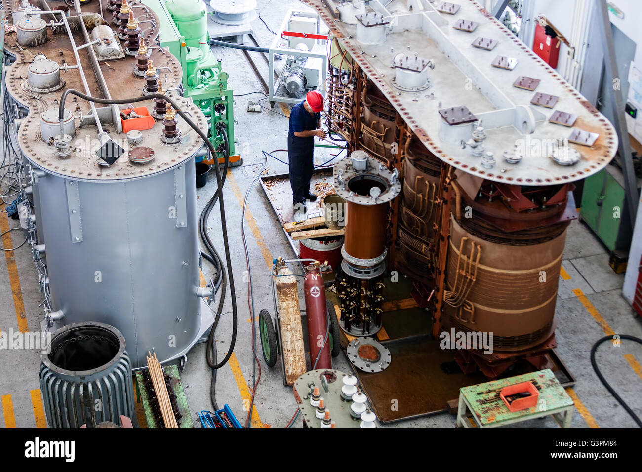 details of broken high voltage power transformer at repair shop Stock ...