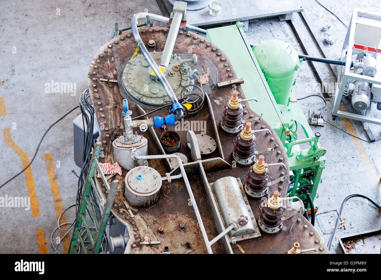 details of broken high voltage power transformer at repair shop Stock ...