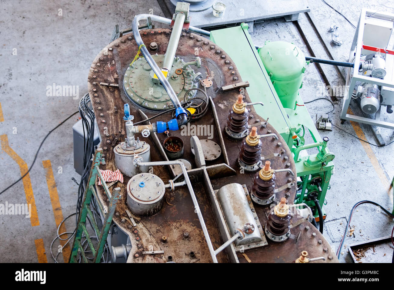 details of broken high voltage power transformer at repair shop Stock ...