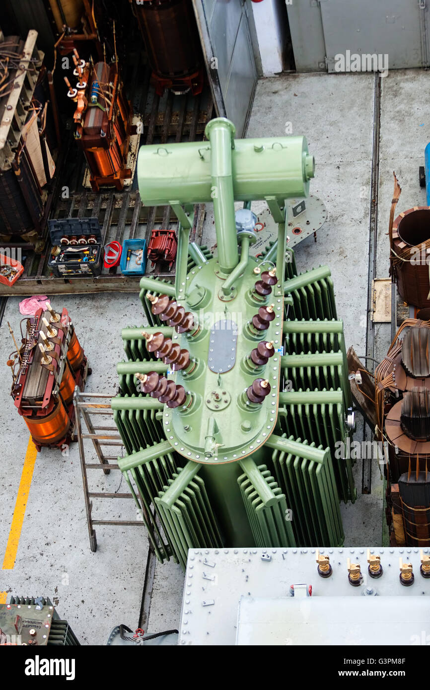 details of broken high voltage power transformer at repair shop Stock ...