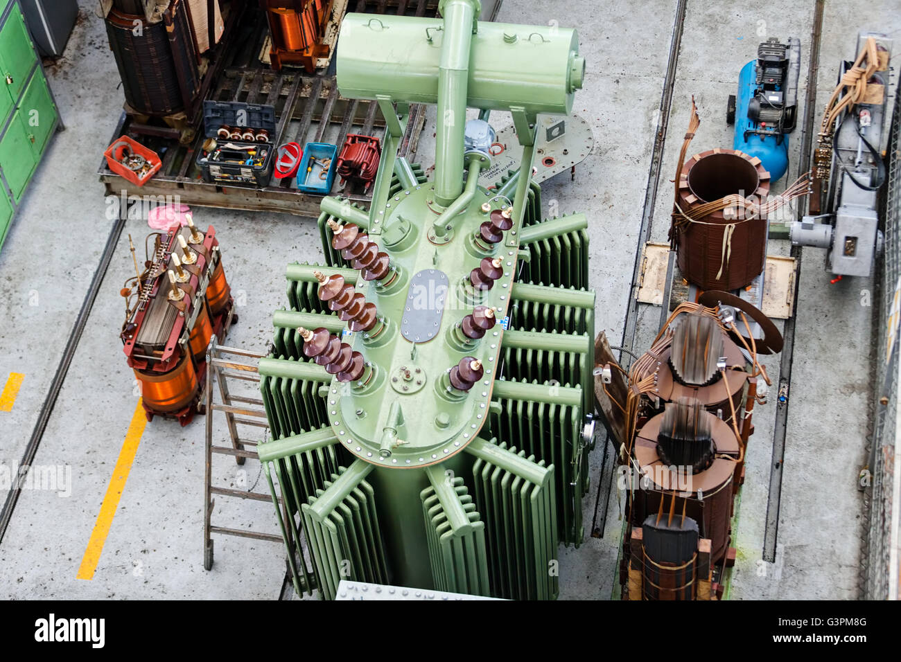 details of broken high voltage power transformer at repair shop Stock ...