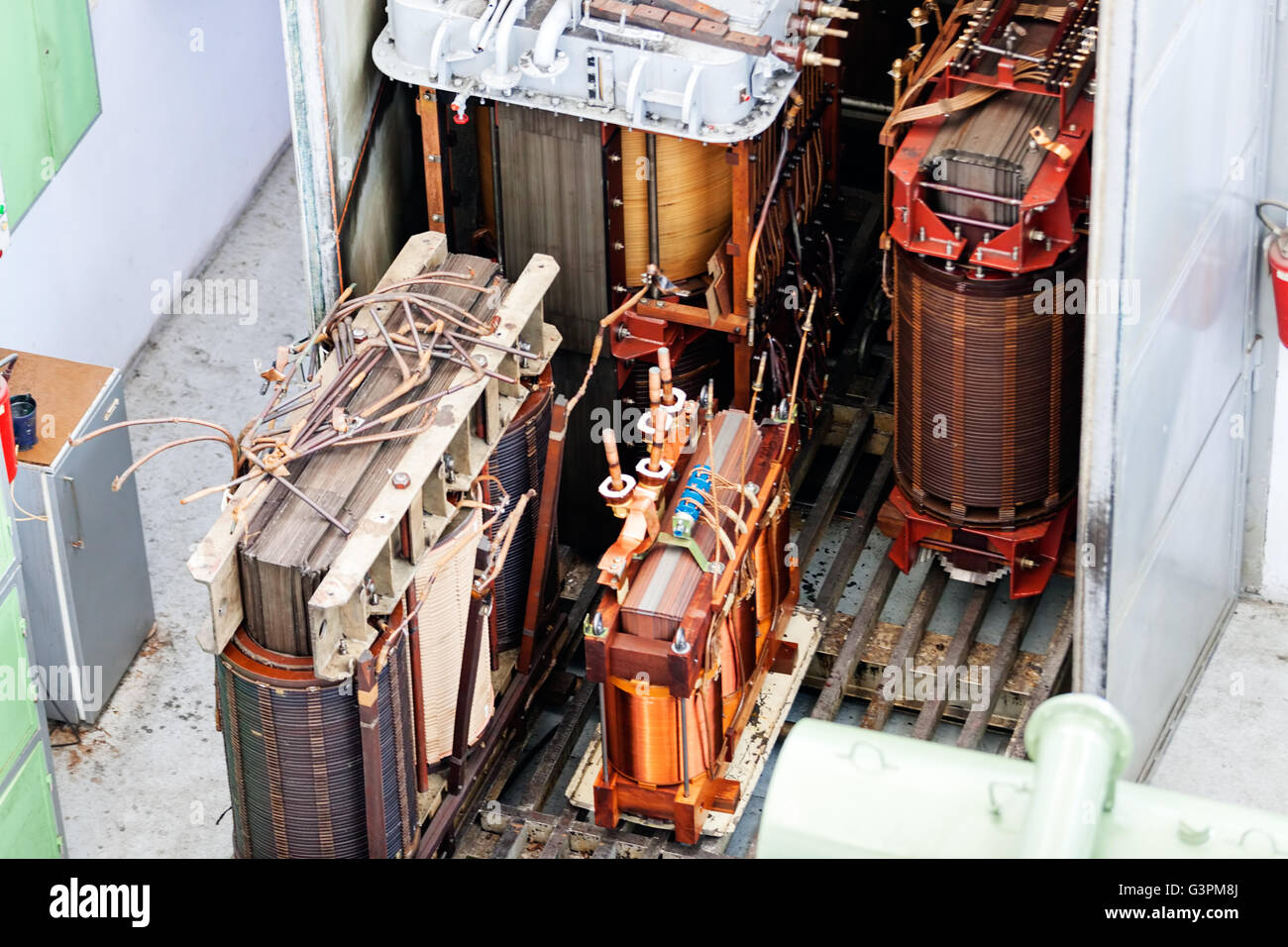 details of broken high voltage power transformer at repair shop Stock ...