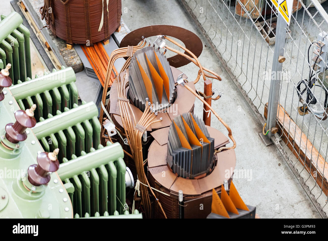 details of broken high voltage power transformer at repair shop Stock ...