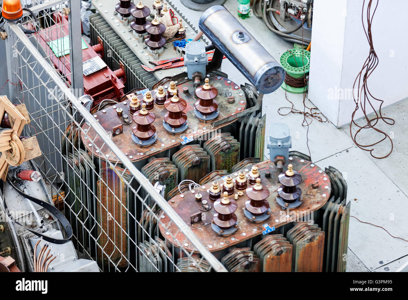 details of broken high voltage power transformer at repair shop Stock ...