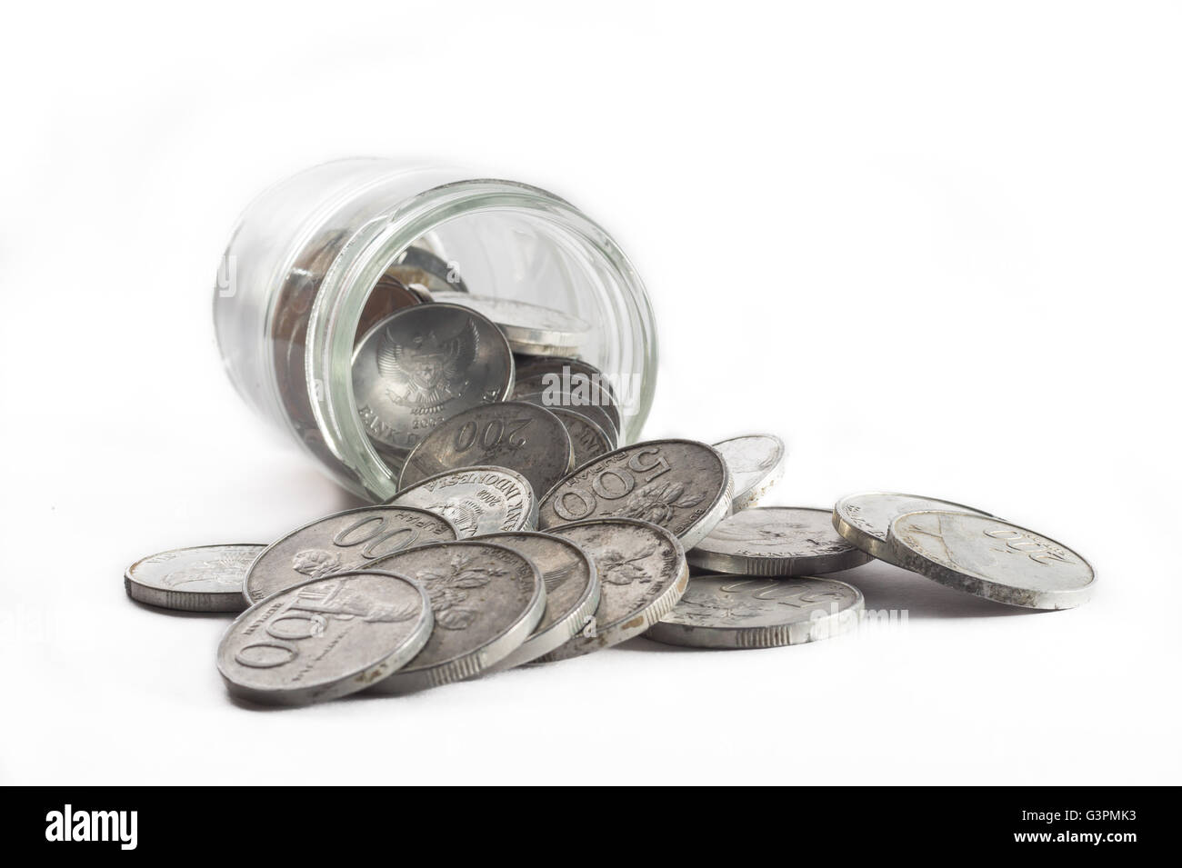 Rupiah Coin inside of Jar Stock Photo - Alamy