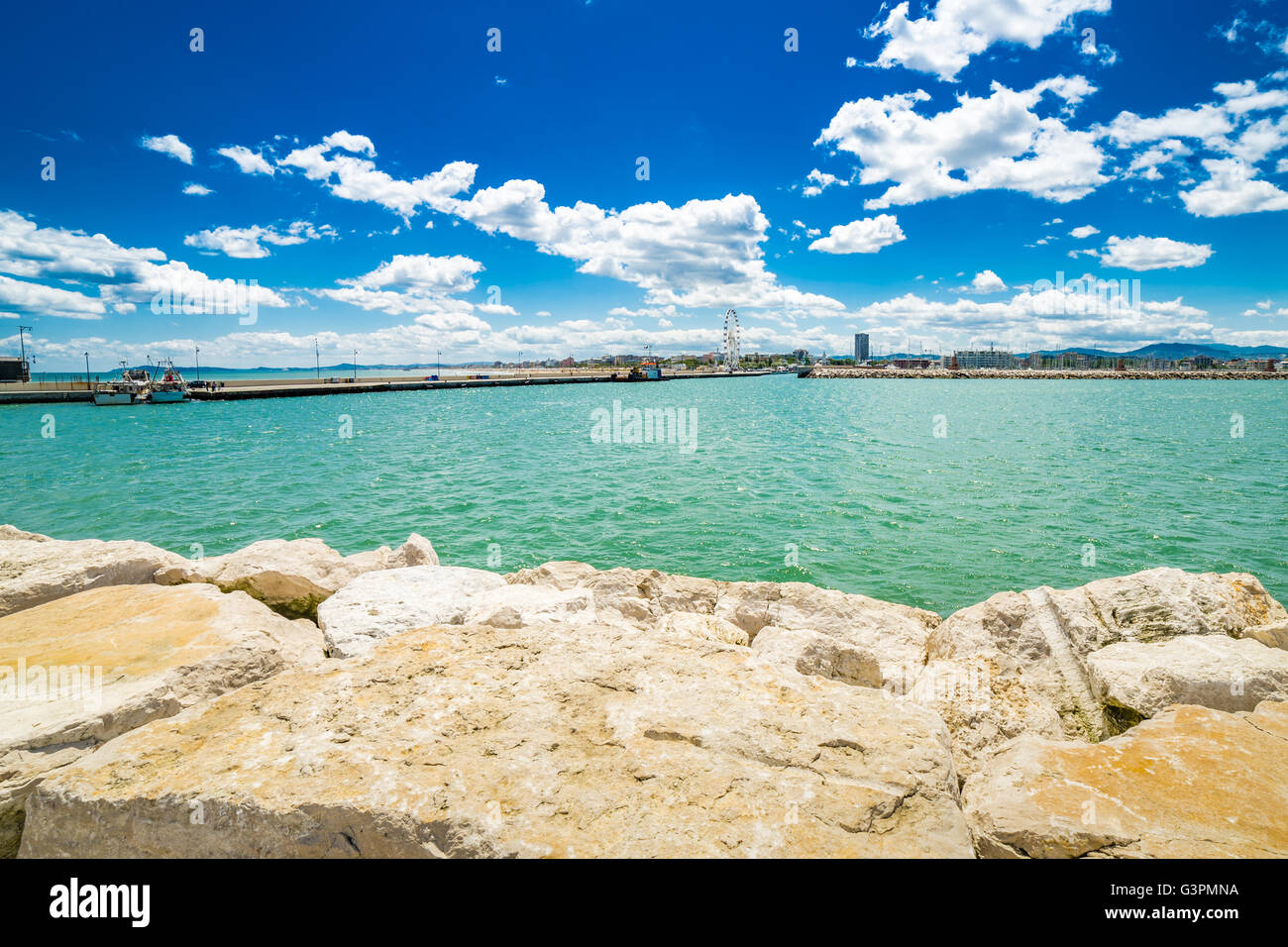 breakwater in the Adriatic Sea off the coast with ancient and modern ...