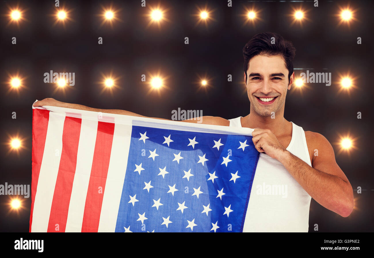 Composite image of athlete posing with american flag Stock Photo - Alamy