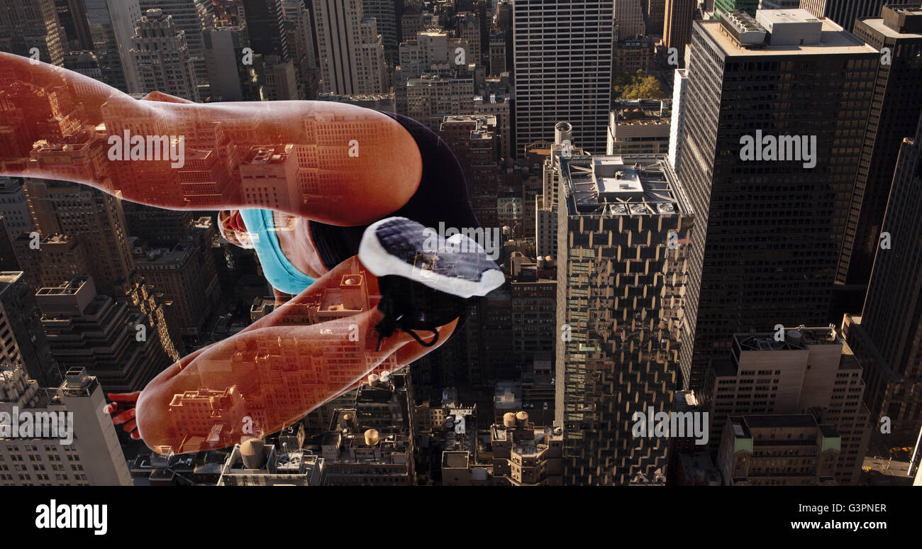 Composite image of low angle female athlete jumping Stock Photo - Alamy