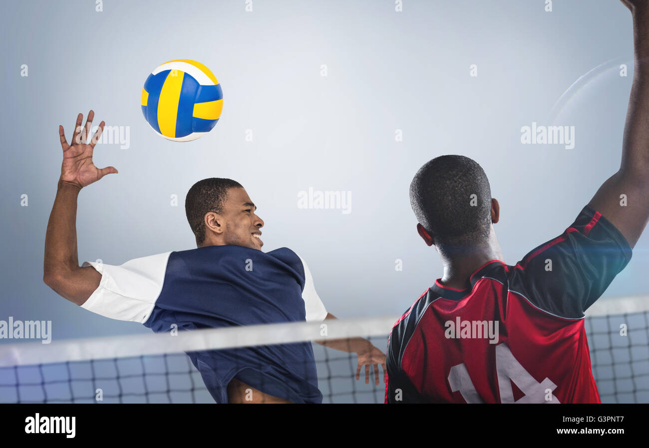 Composite image of rear view of sportsman posing while playing ...