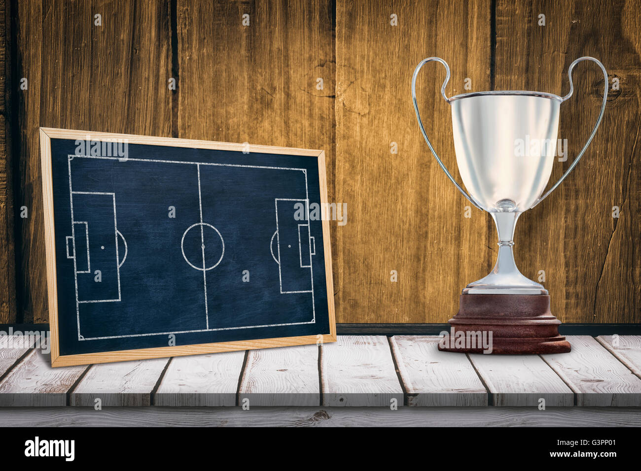 Composite image of focus on a trophy Stock Photo - Alamy