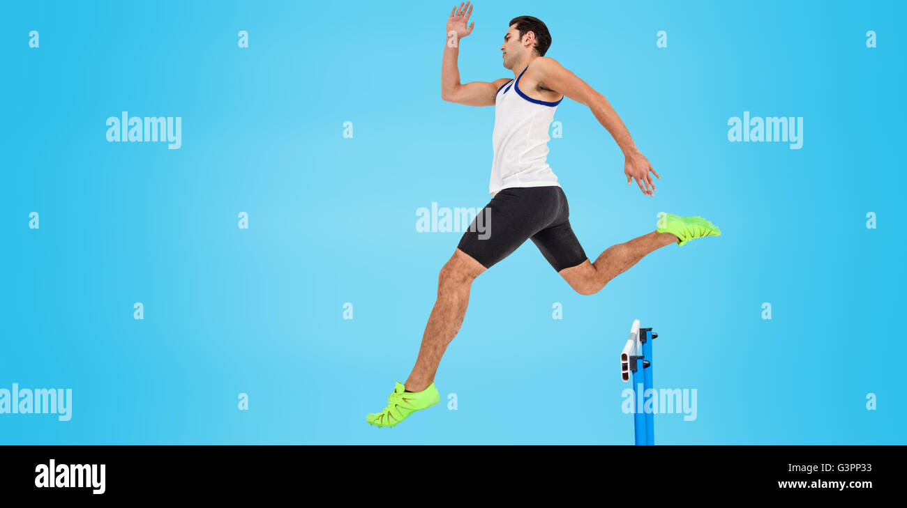 Male athlete running on blue background Stock Photo - Alamy