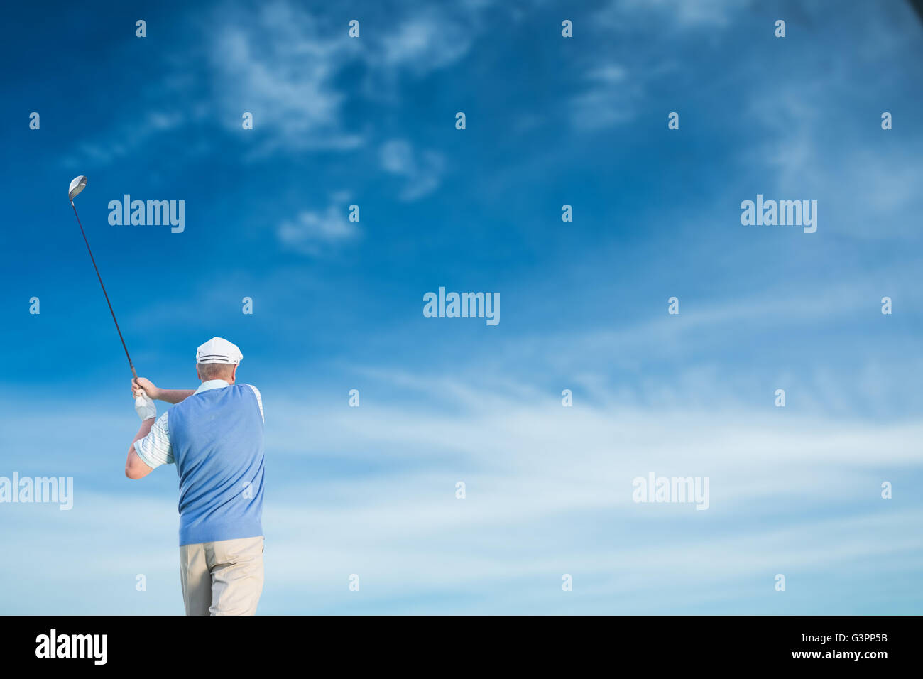 Rear view of man playing golf Stock Photo - Alamy