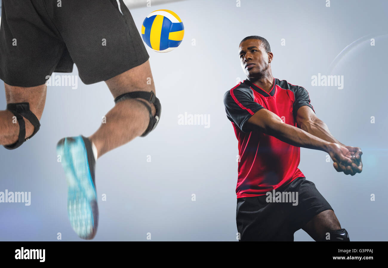 Composite image of rear view of sportsman posing while playing ...