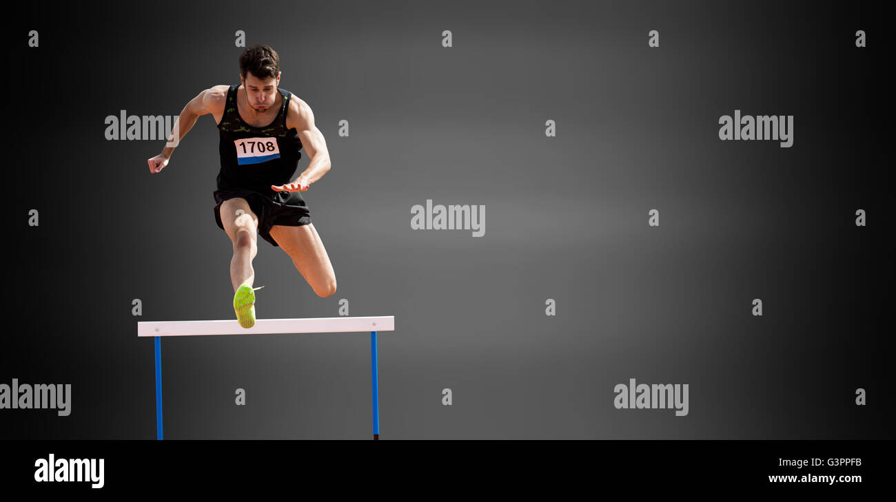 Sportsman practising hurdles Stock Photo - Alamy