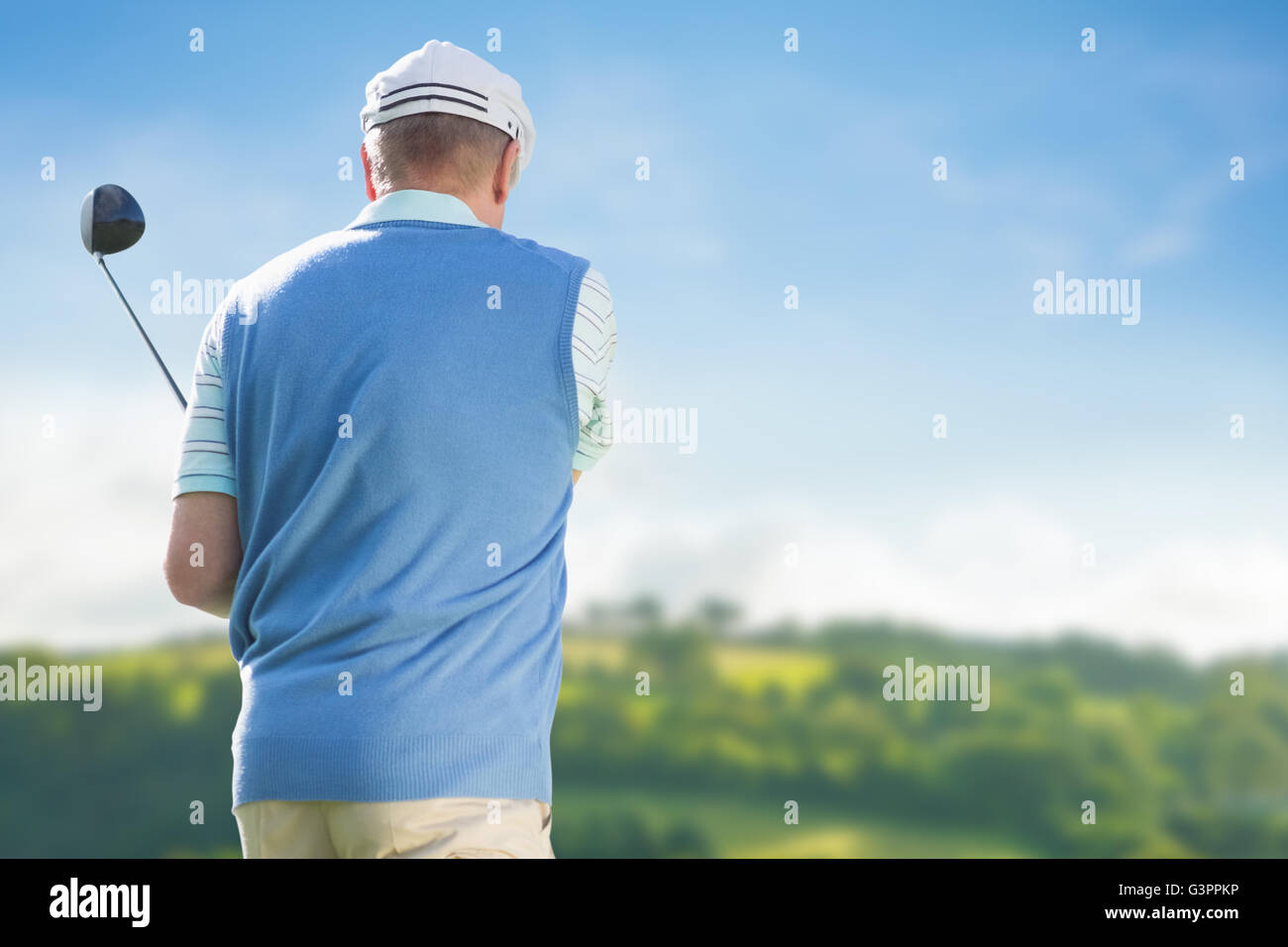 Rear view of man playing golf Stock Photo - Alamy