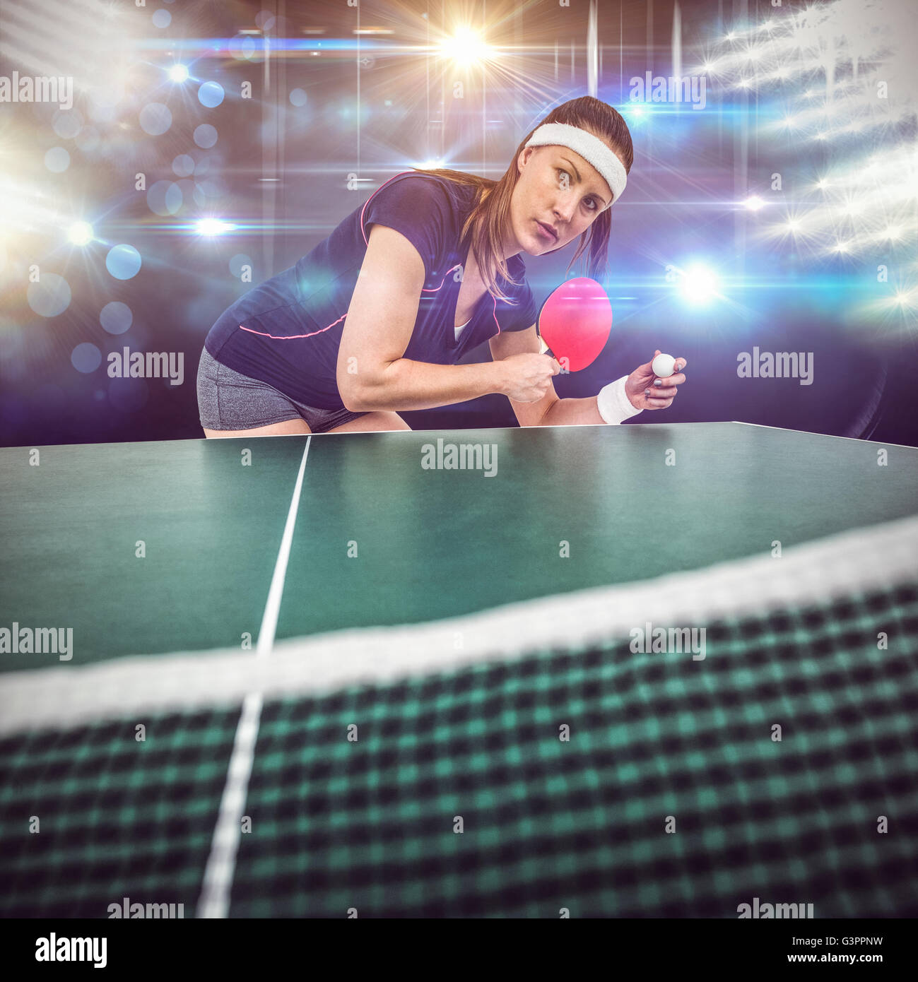 Composite image of female athlete playing table tennis Stock Photo - Alamy