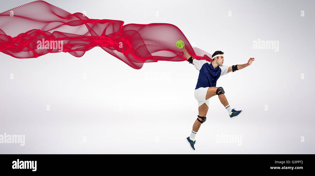 Composite image of sportsman throwing a ball Stock Photo - Alamy