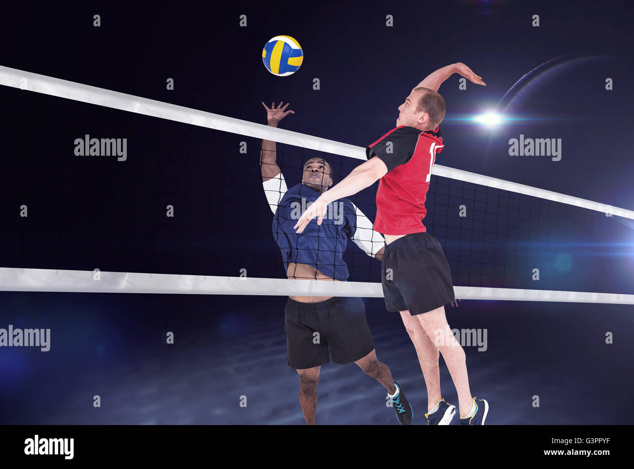 Young man jumping hitting volleyball hi-res stock photography and ...