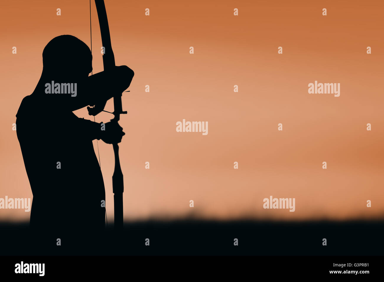 Rear view of sportsman doing archery Stock Photo - Alamy