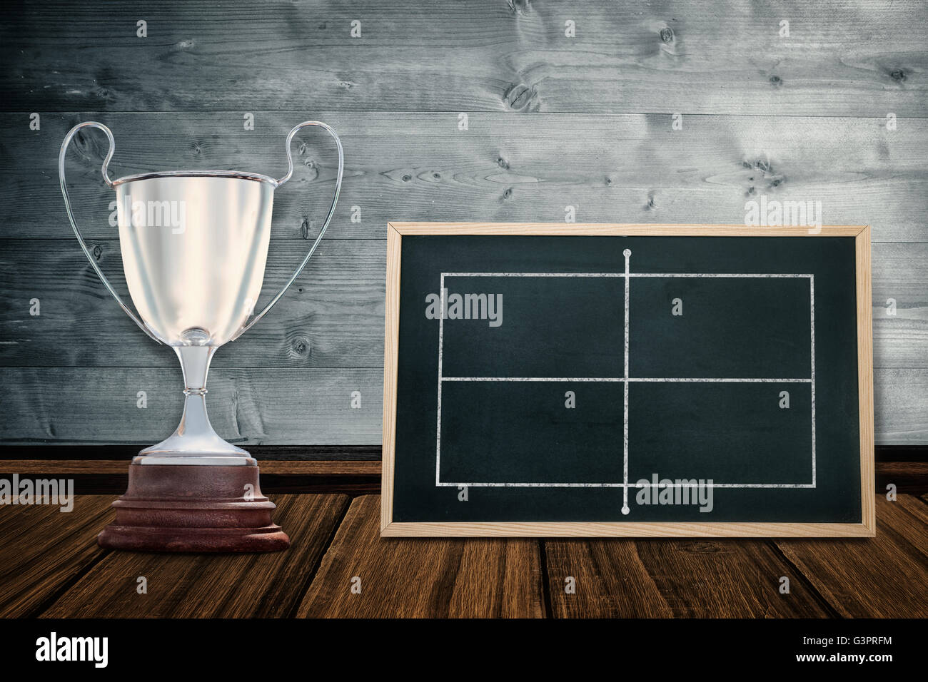 Composite image of focus on a trophy Stock Photo - Alamy
