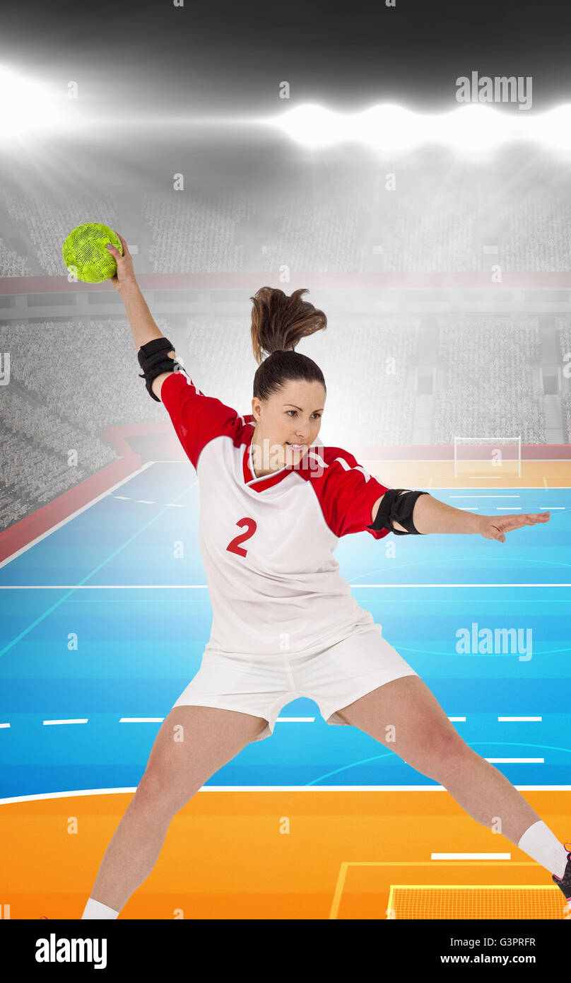 Composite image of sportswoman throwing a ball Stock Photo - Alamy