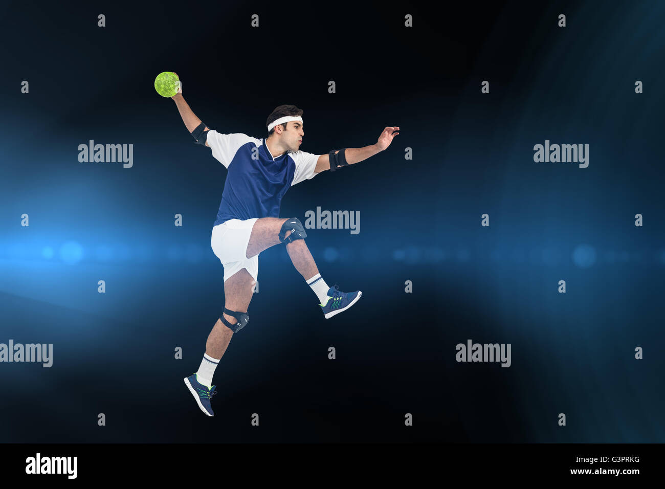 Sportsman throwing a ball Stock Photo - Alamy