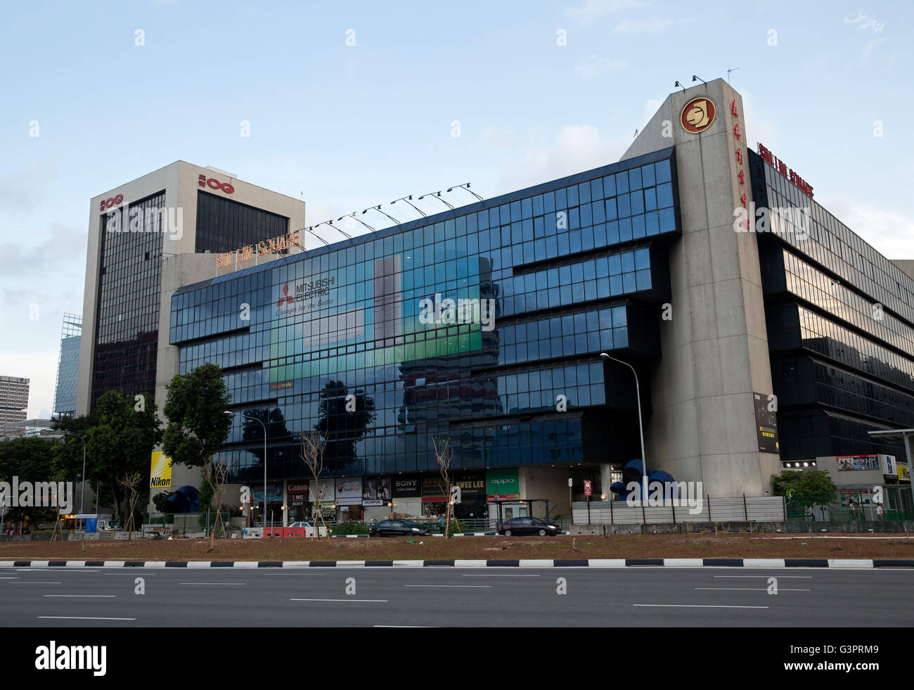 Colourful buildings and the OG building, shopping mall, in Singapore ...