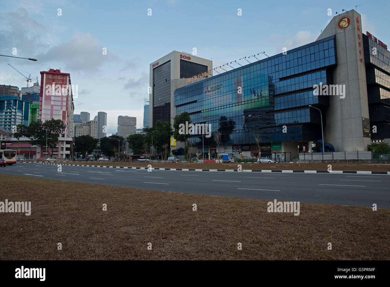 Colourful buildings and the OG building, shopping mall, in Singapore ...