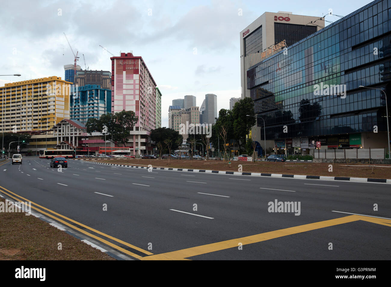 Colourful buildings and the OG building, shopping mall, in Singapore ...