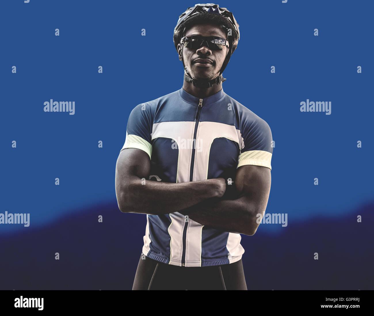 Composite image of cyclist crossing his arms Stock Photo - Alamy