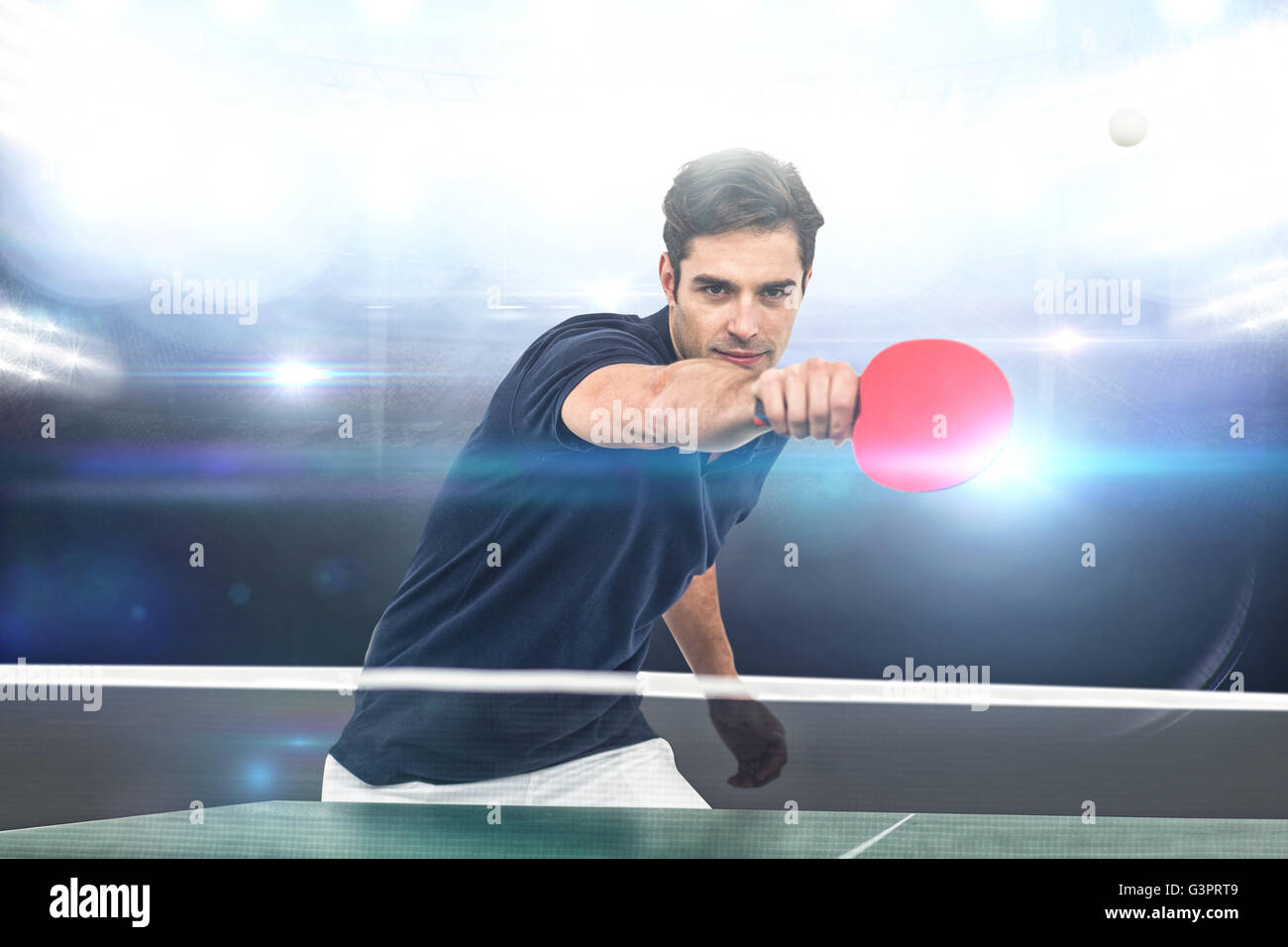 Composite image of portrait of male athlete playing table tennis Stock ...