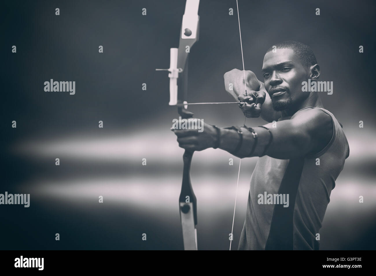 Front view of sportsman practicing archery Stock Photo - Alamy