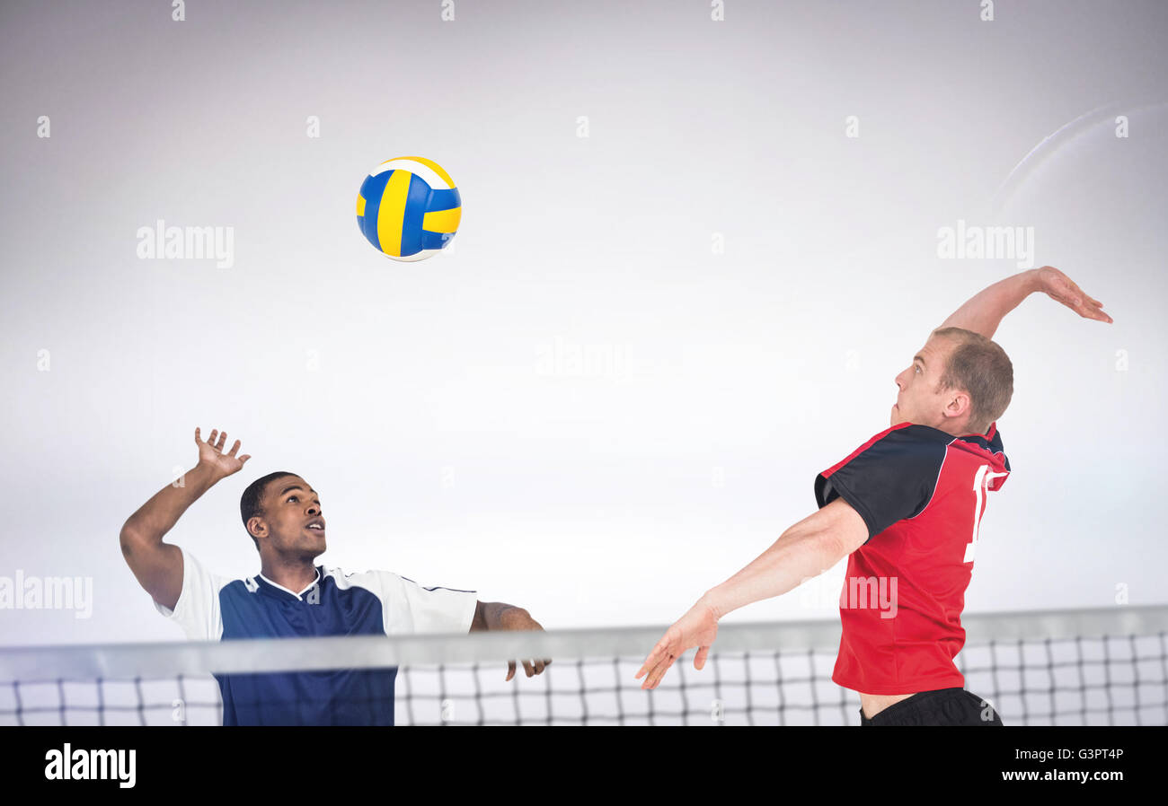 Young man jumping hitting volleyball hi-res stock photography and ...