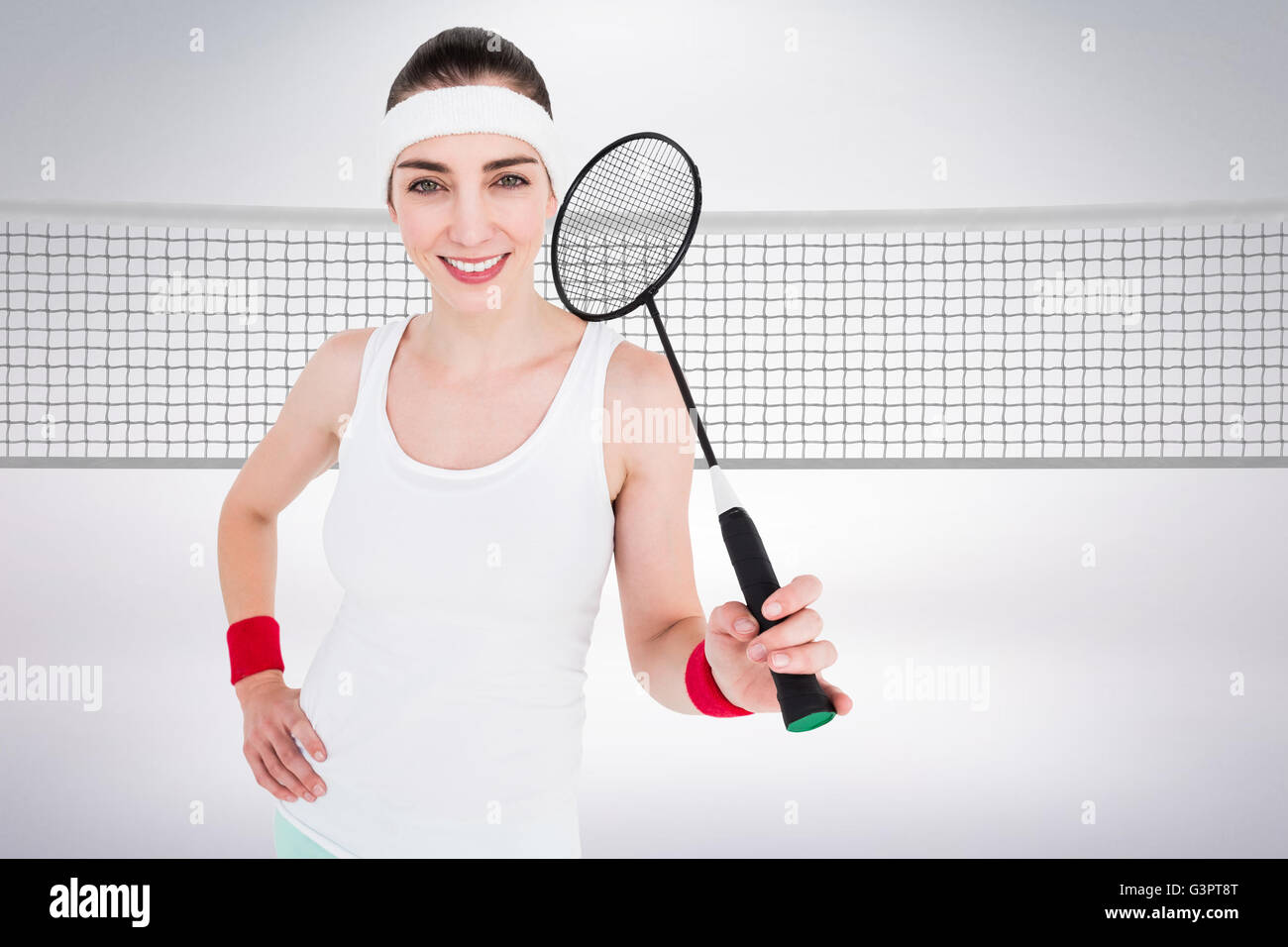 Composite image of badminton player is posing and smiling Stock Photo ...