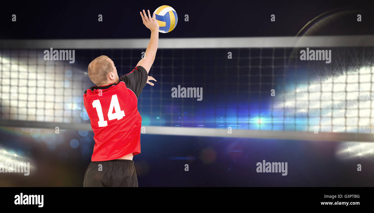 Composite image of rear view of sportsman hitting volleyball Stock ...