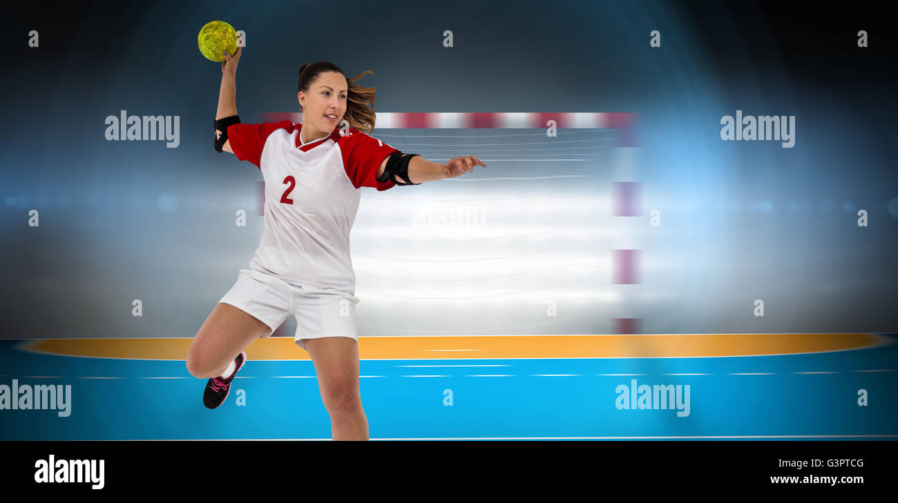 Composite image of sportswoman throwing a ball Stock Photo - Alamy