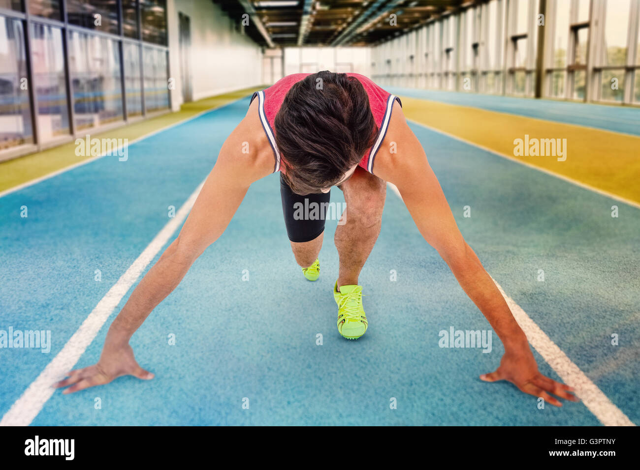 Composite image of male athlete in ready to run position Stock Photo ...