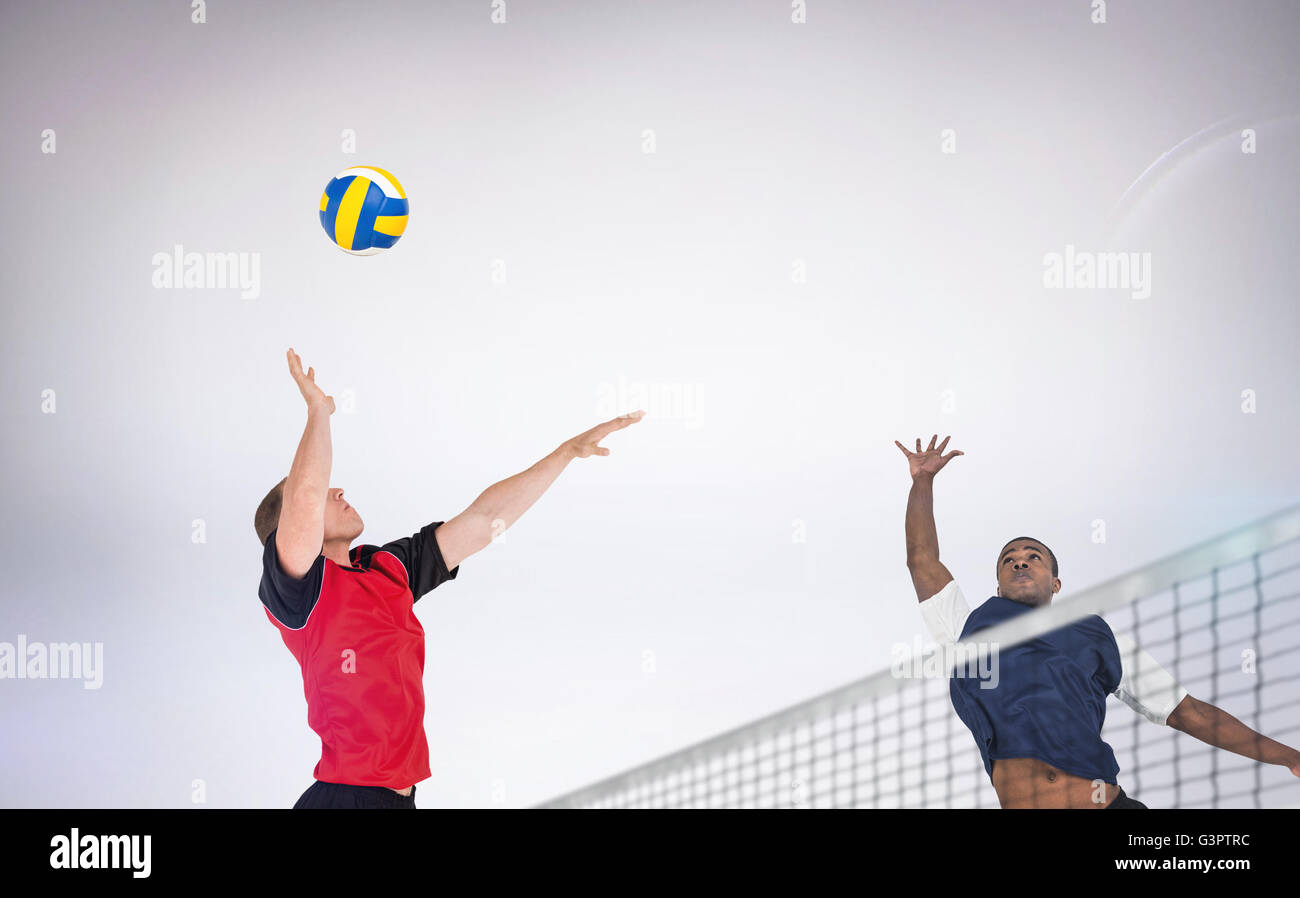 Young man jumping hitting volleyball hi-res stock photography and ...