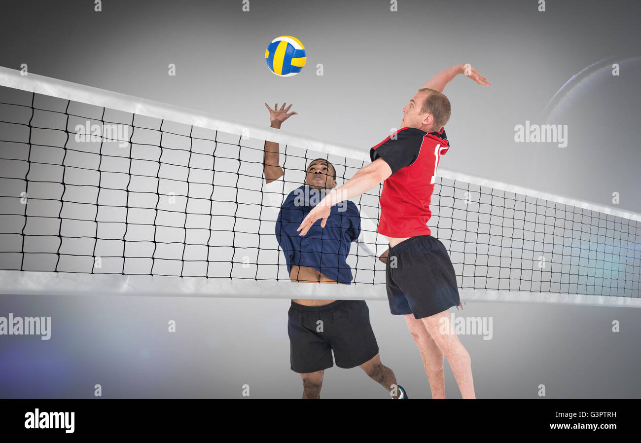 Young man jumping hitting volleyball hi-res stock photography and ...
