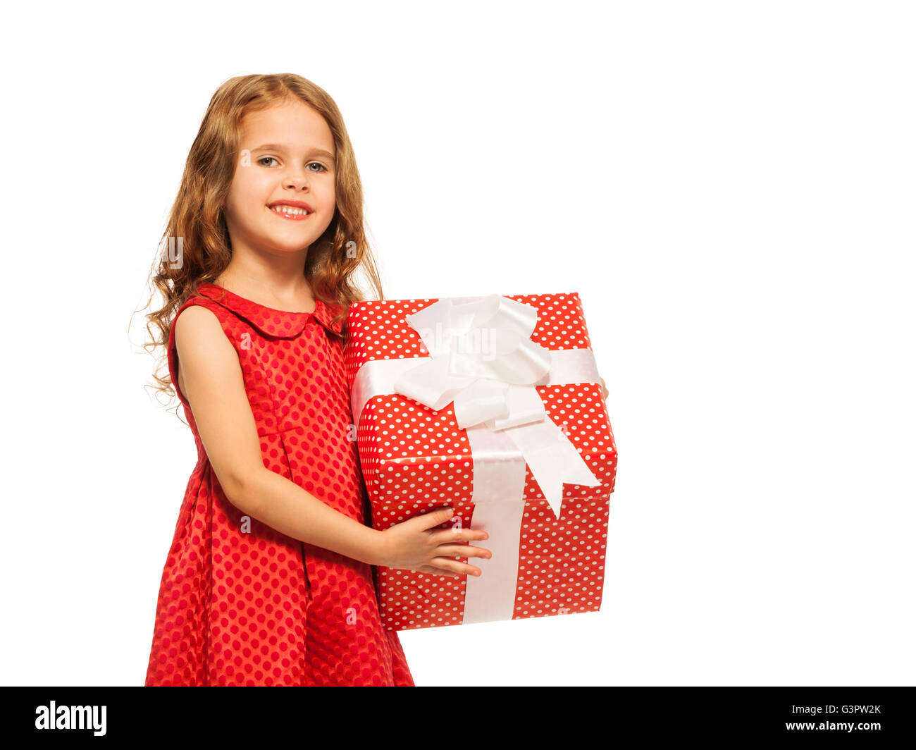 Portrait of little girl with huge red present Stock Photo - Alamy